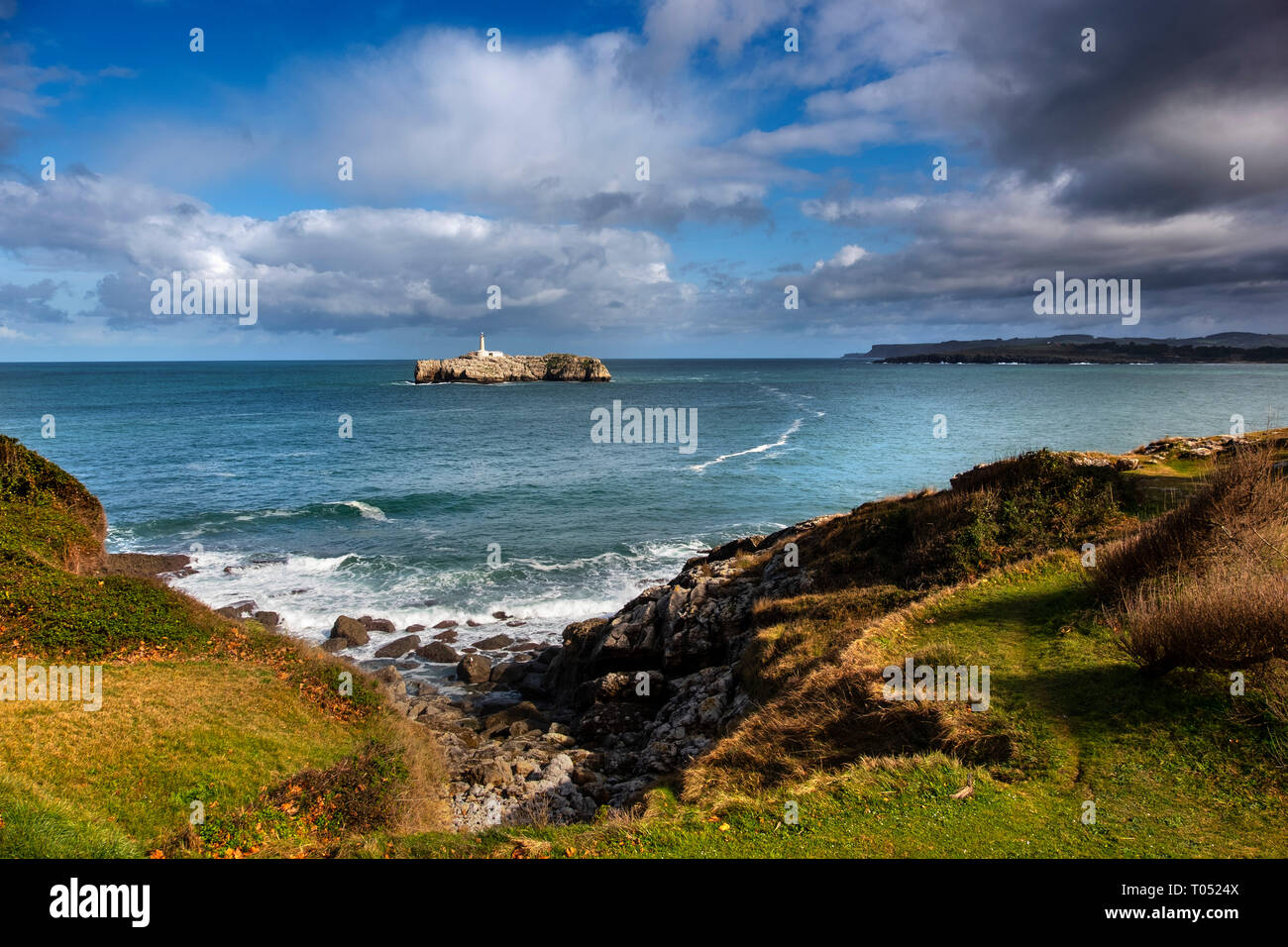 Mouro island and lighthouse from Peninsula de la Magdalena. Santander ...