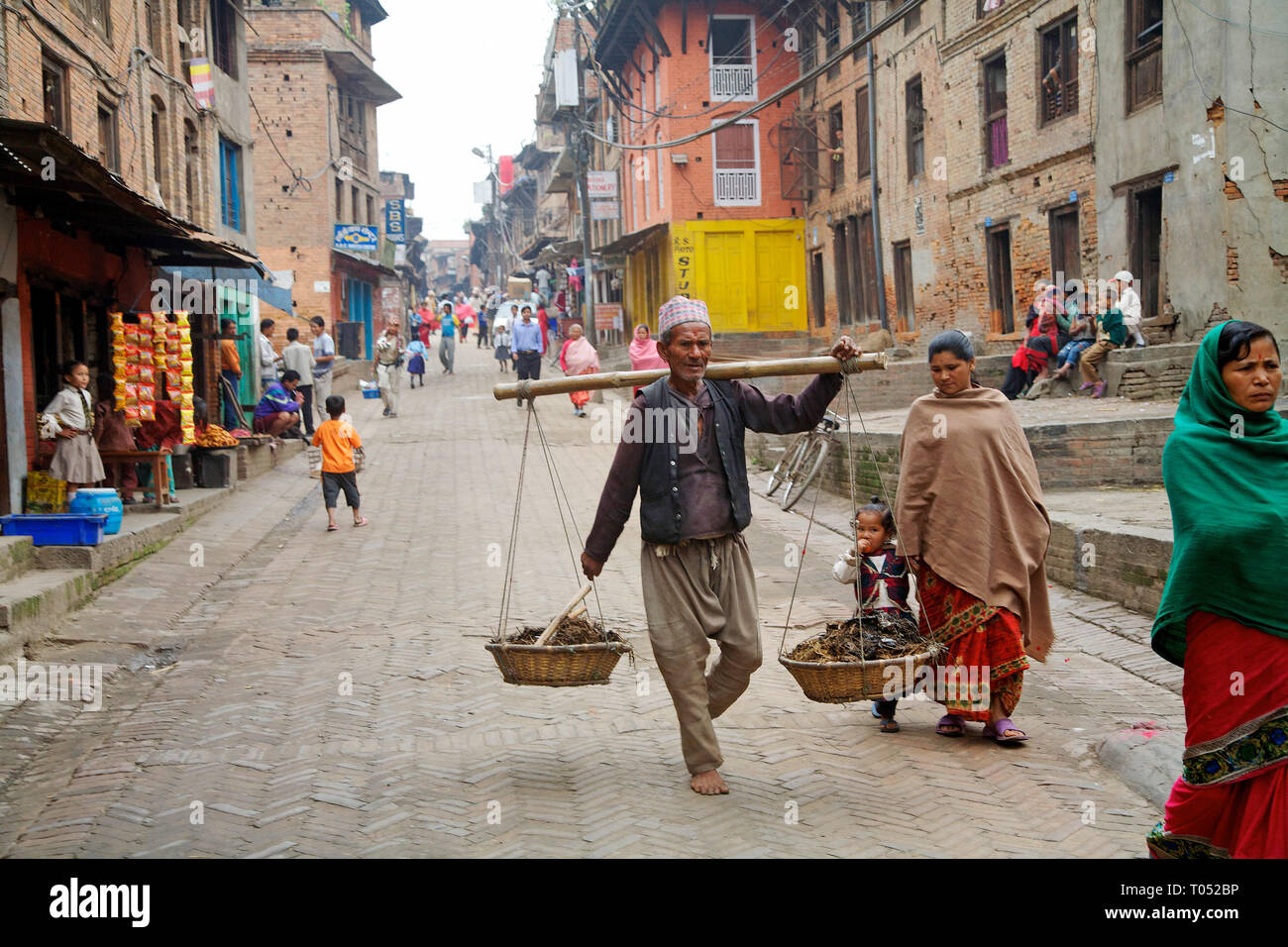Shoulder carrying pole hi-res stock photography and images - Alamy