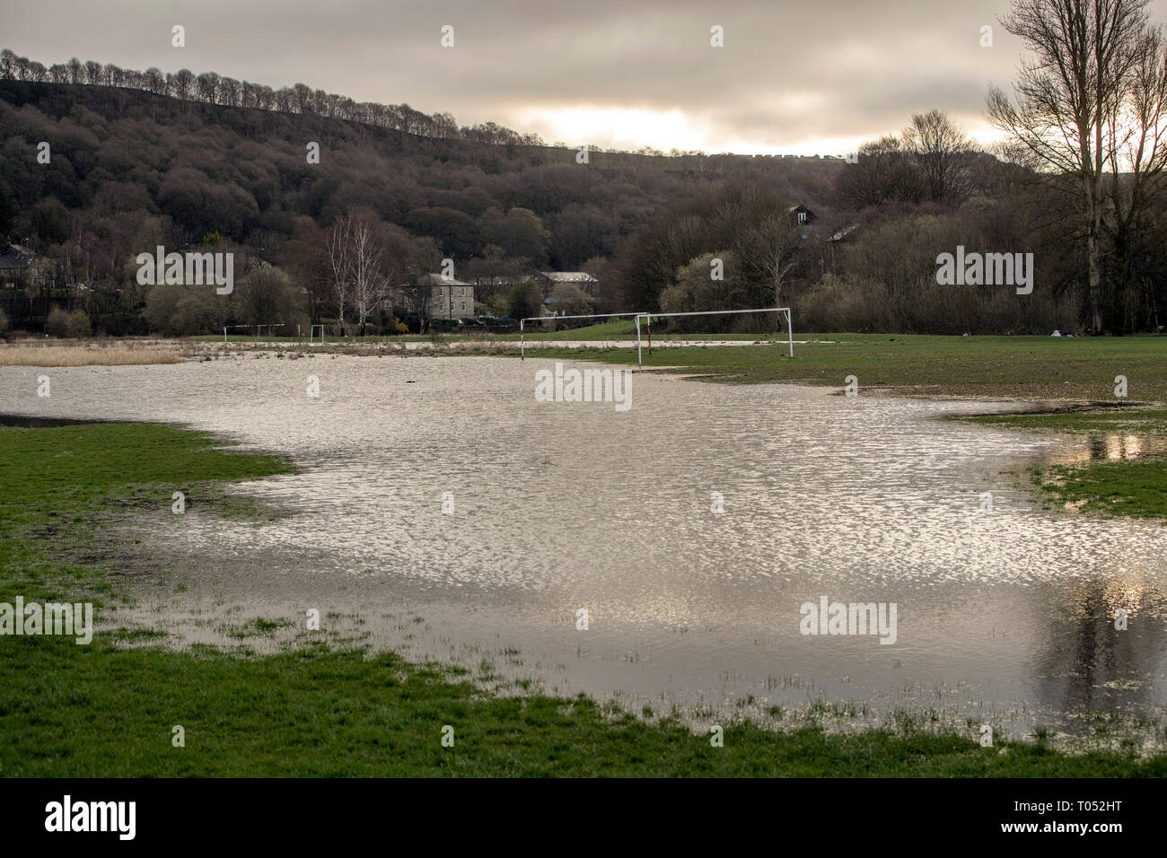 A flooded football pitch in Mytholmroyd, Yorkshire, as flood warnings ...