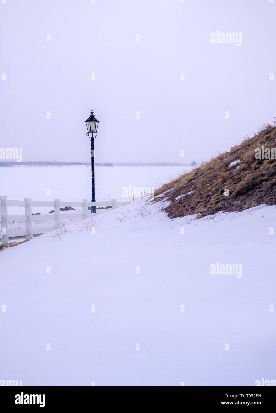 Light pole in the snow Stock Photo - Alamy