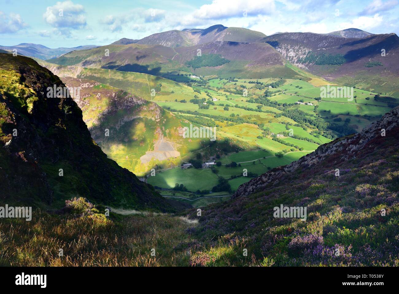 Sunlight falling across the Cumbrian Mountains Stock Photo - Alamy