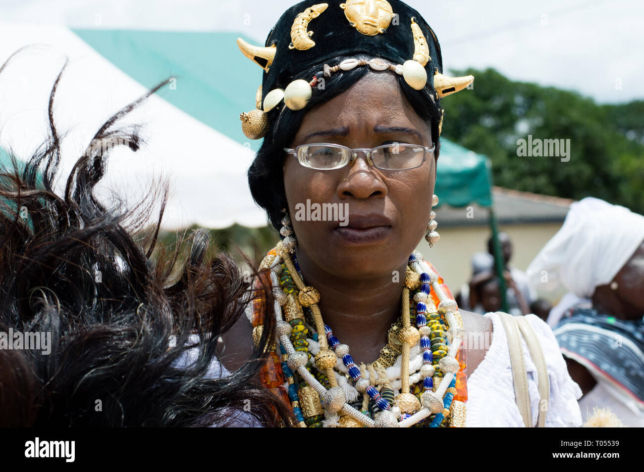 adzopé, ivory coast-august 31, 2016: young woman with necklaces ...