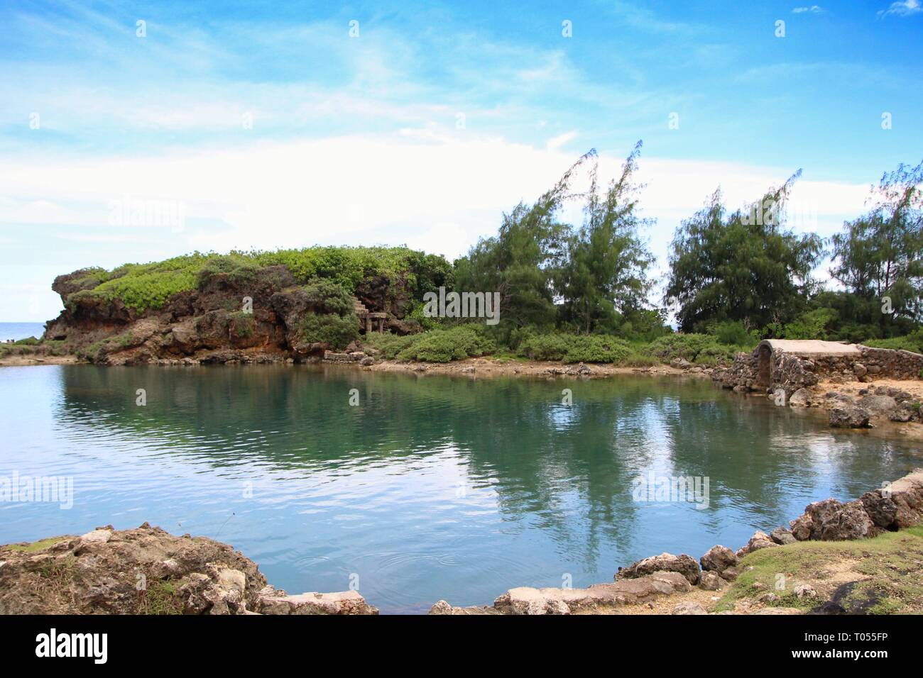 Clear green waters of Inarajan Lagoon, a village on the southeastern ...