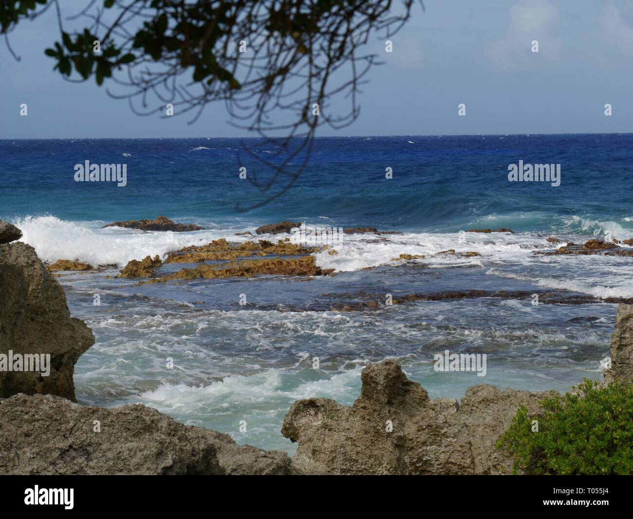Coastal view of a tropical island beach on a windy day Tropical island ...