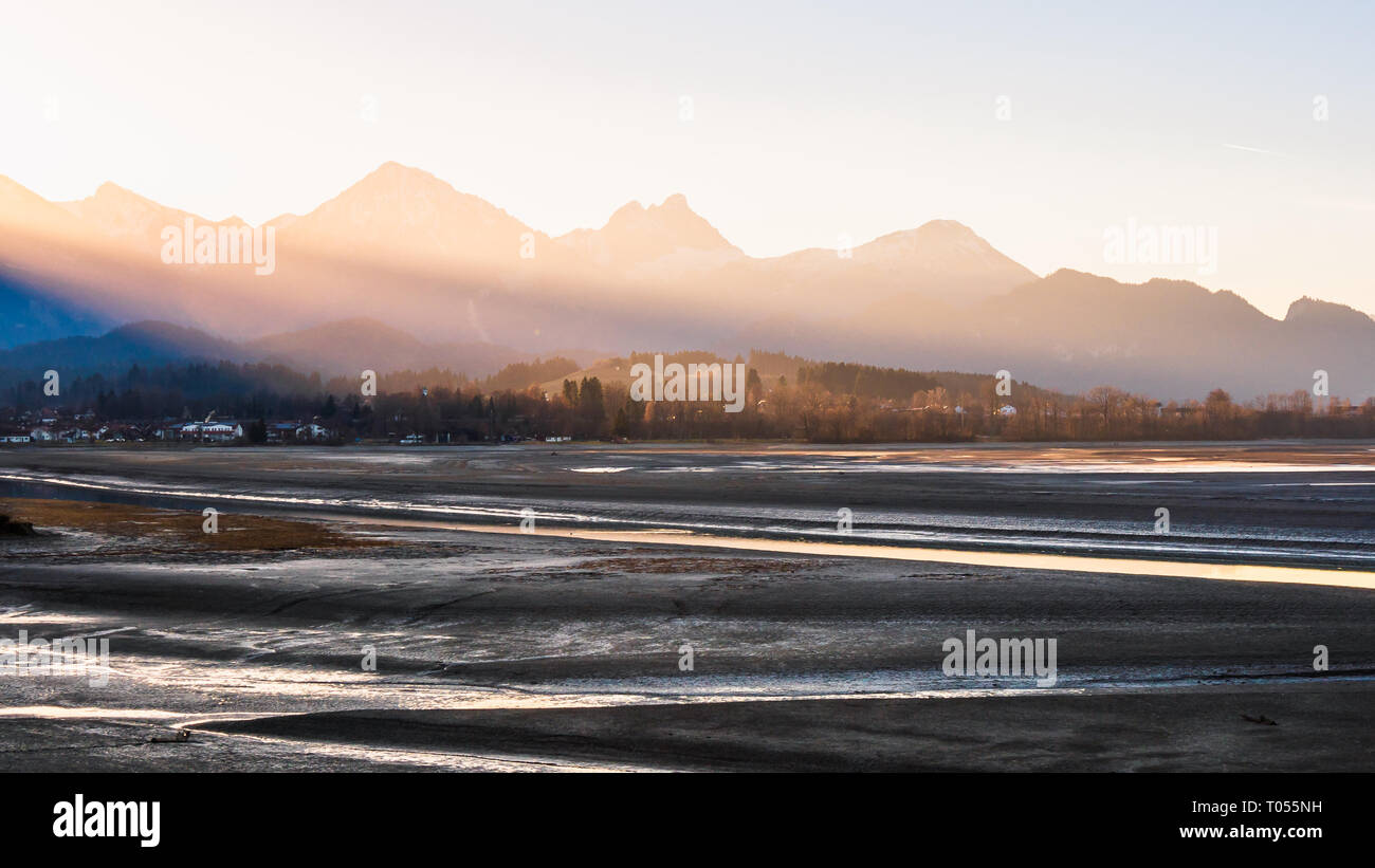 Forggensee in winter without water Stock Photo - Alamy