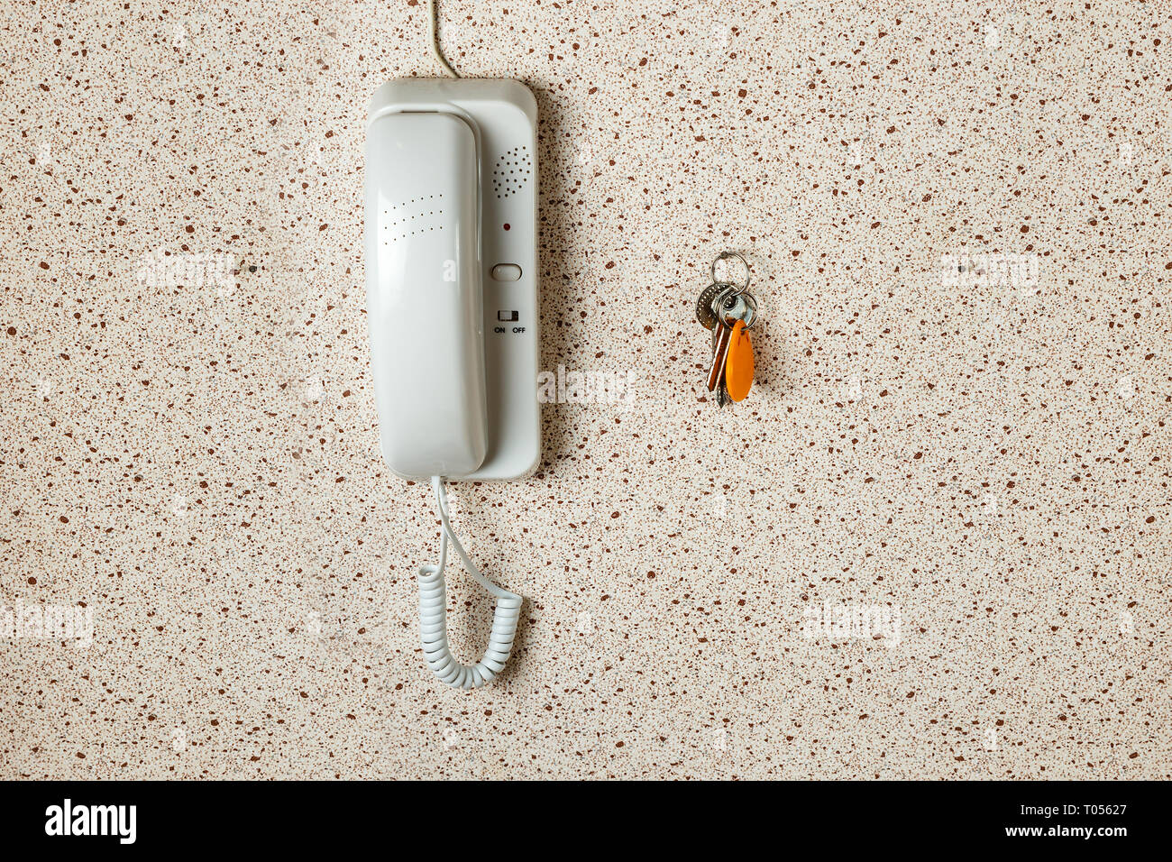 apartment keys and white intercom on the wall of the apartment Stock ...