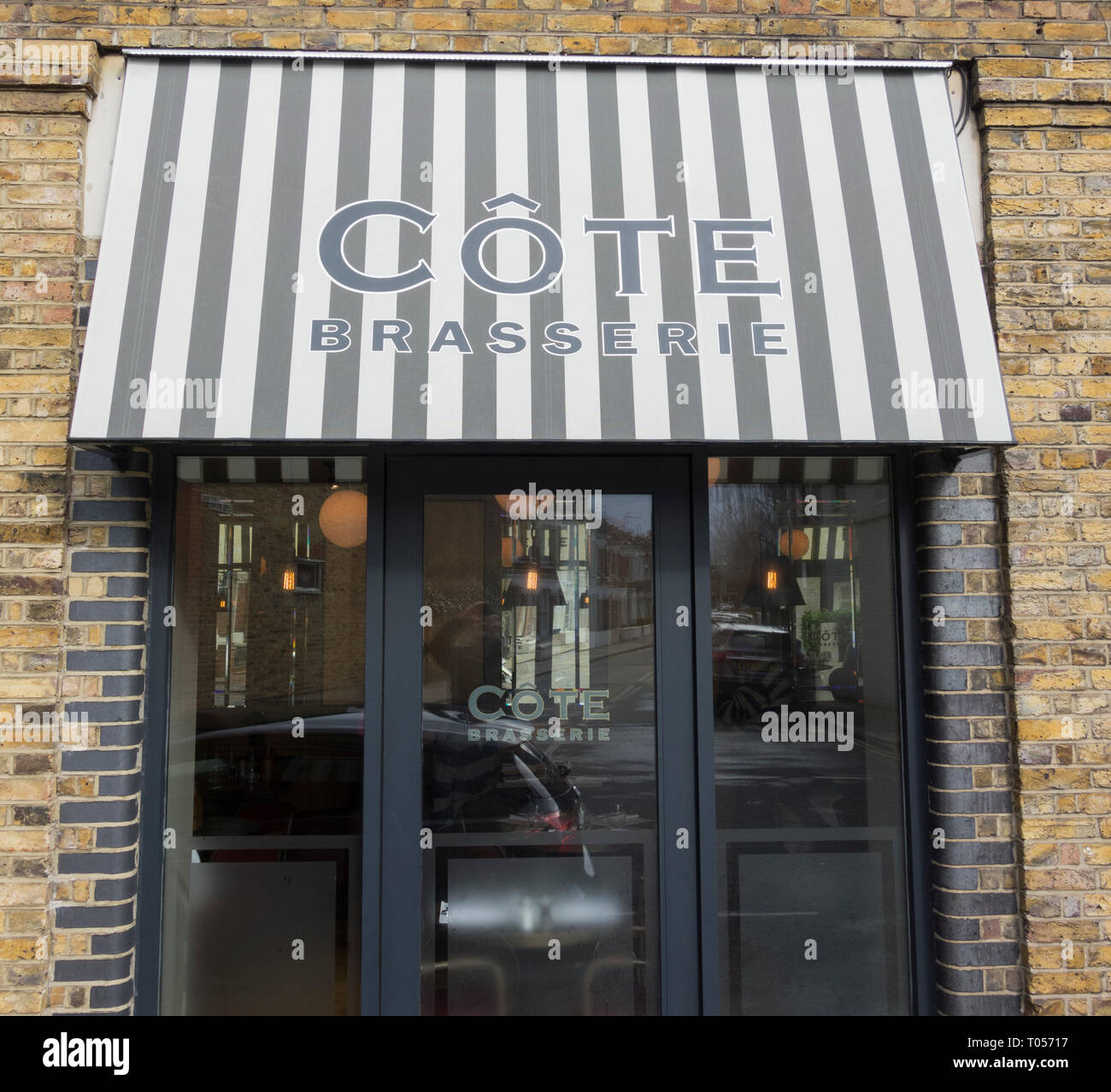 Côte Restaurant and brasserie awning Stock Photo - Alamy