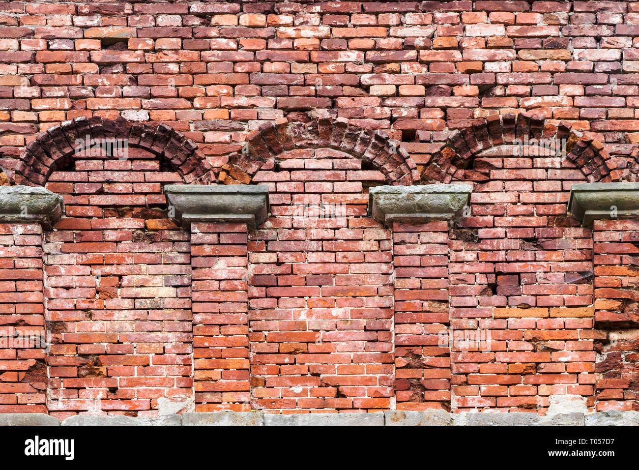 Recess arch frame in old brick wall Stock Photo - Alamy