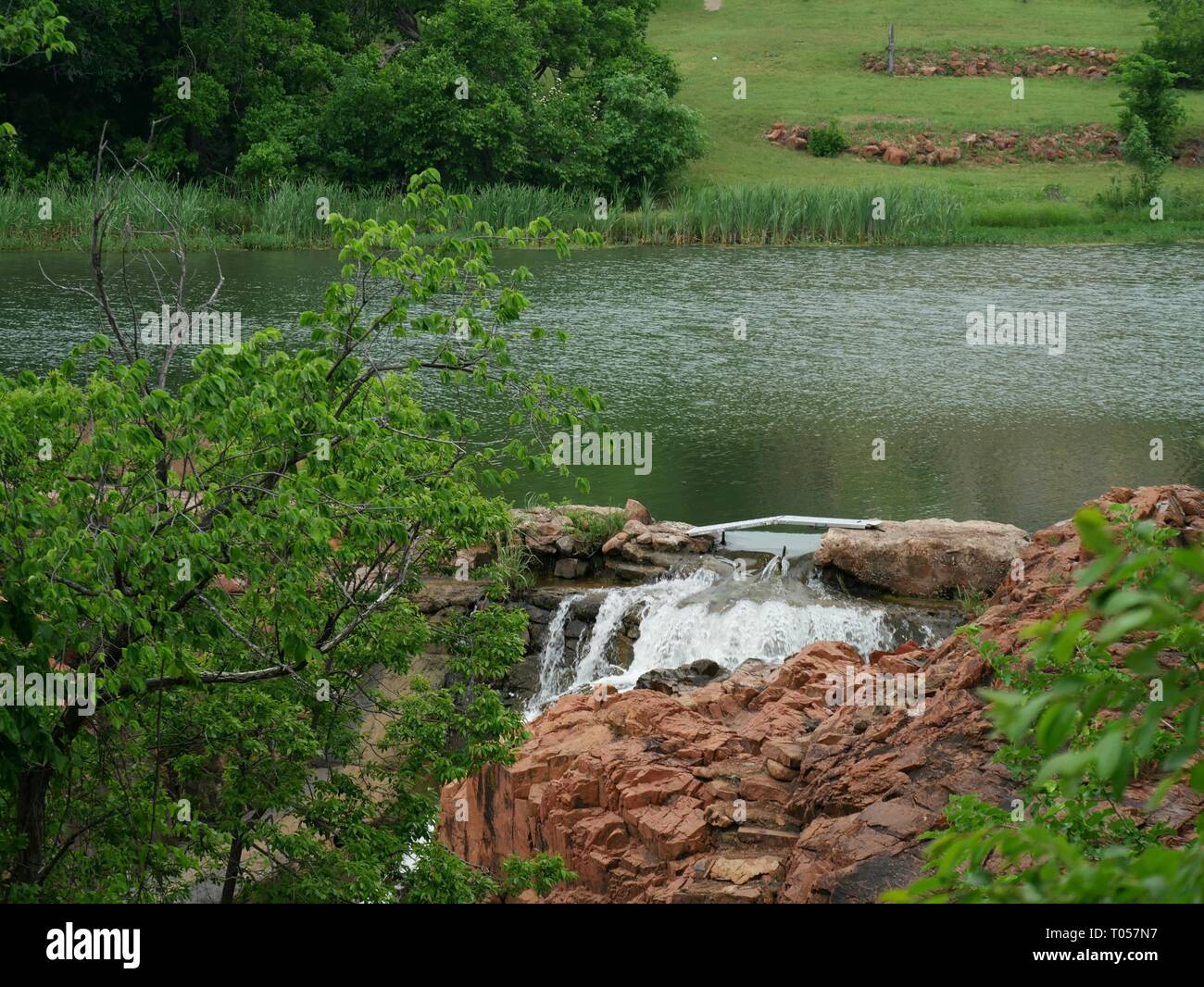 Clear waters of the bath lake in the town of Medicine Park, Oklahoma ...