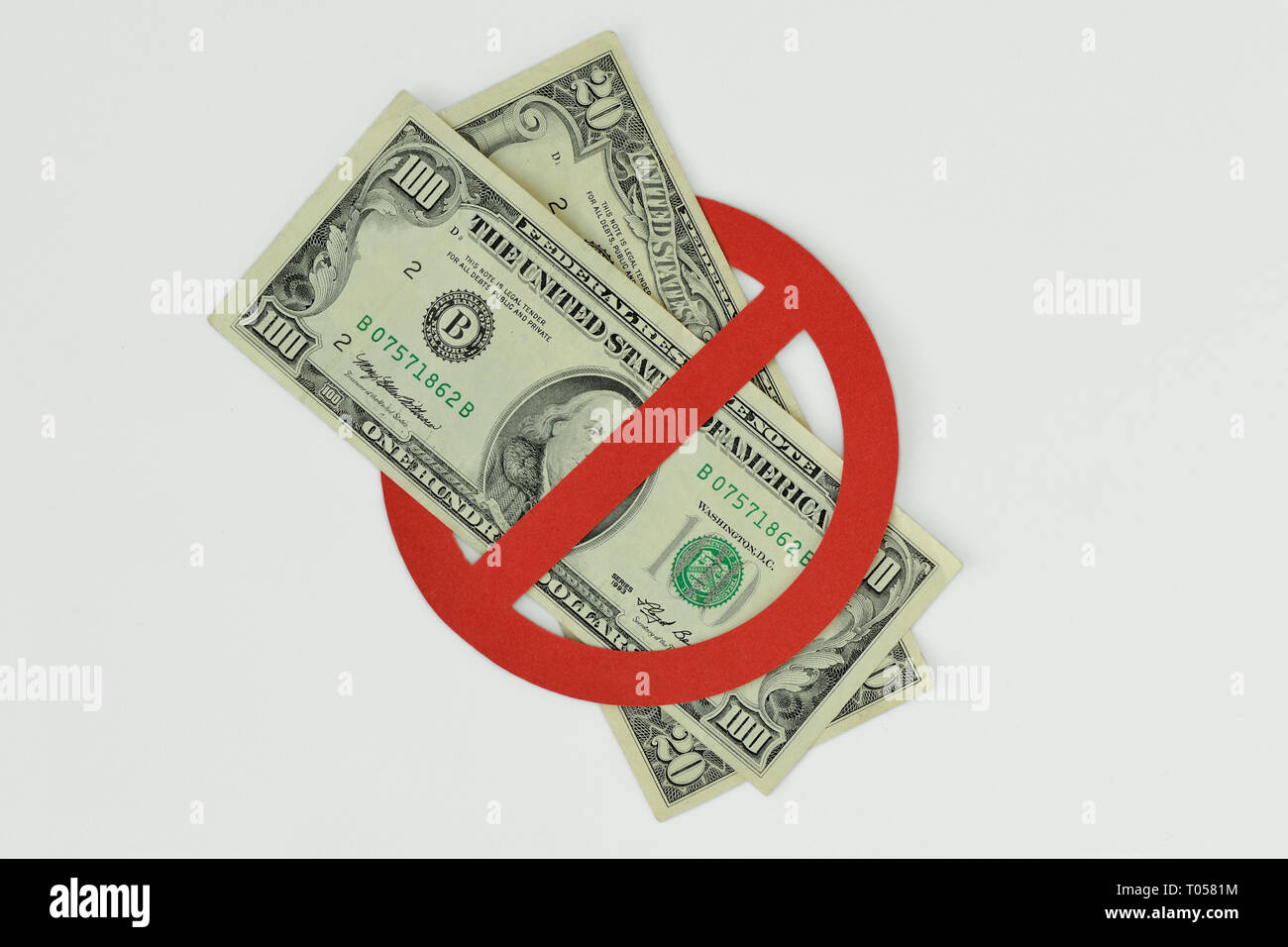 Dollar banknotes in prohibition sign on white background - No money ...