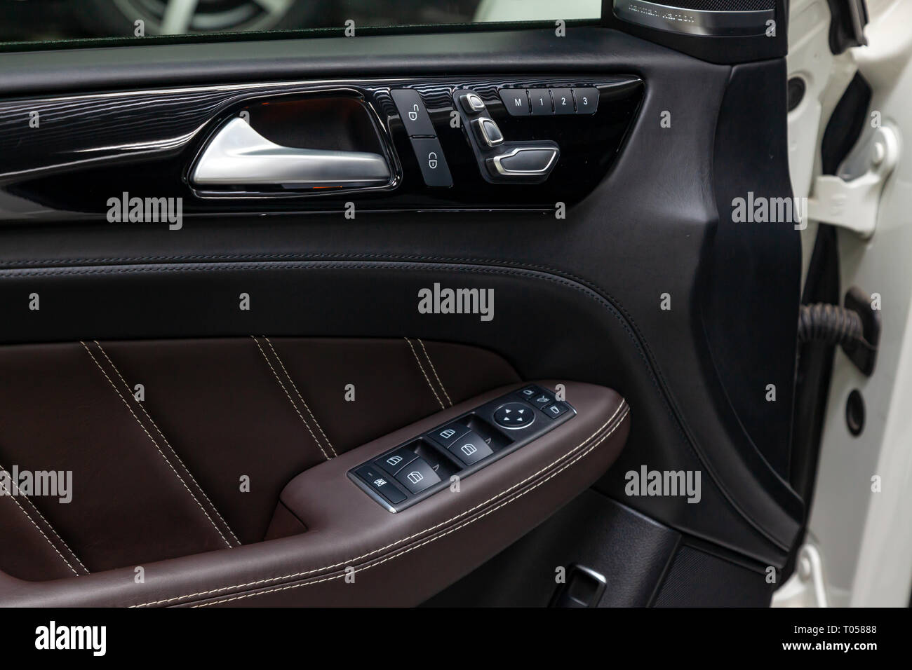 The interior of the luxury business car with a view of the drivers door ...