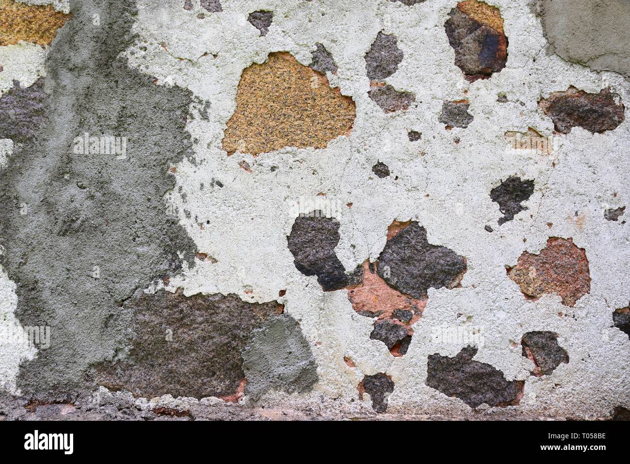 Close up surface of aged and weathered paint on different walls in high ...