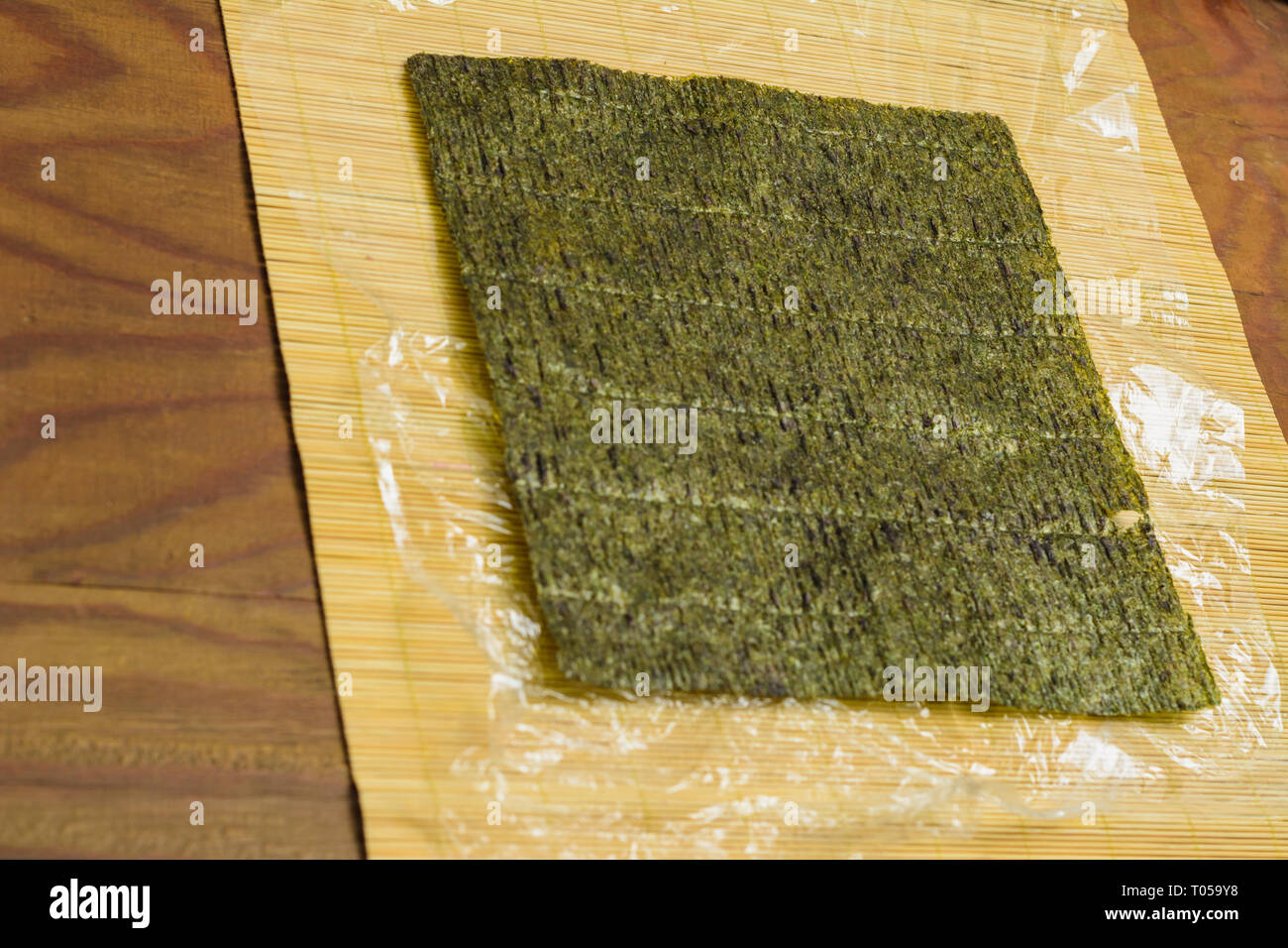 A leaf of a green nori of Japanese cuisine for preparing sushi at home ...