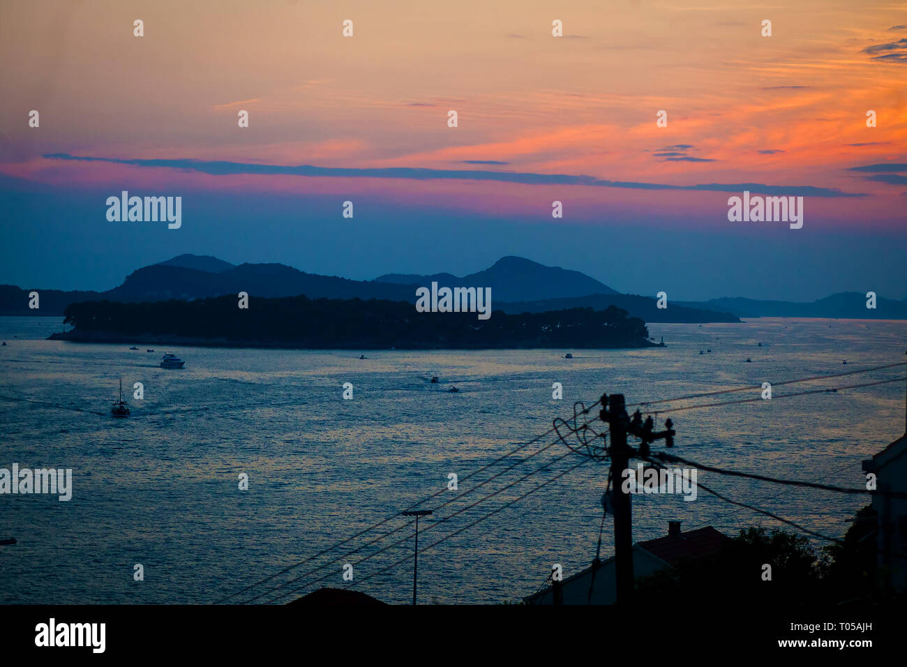 Blue hour sunset over sea with amazing sky colors Stock Photo - Alamy