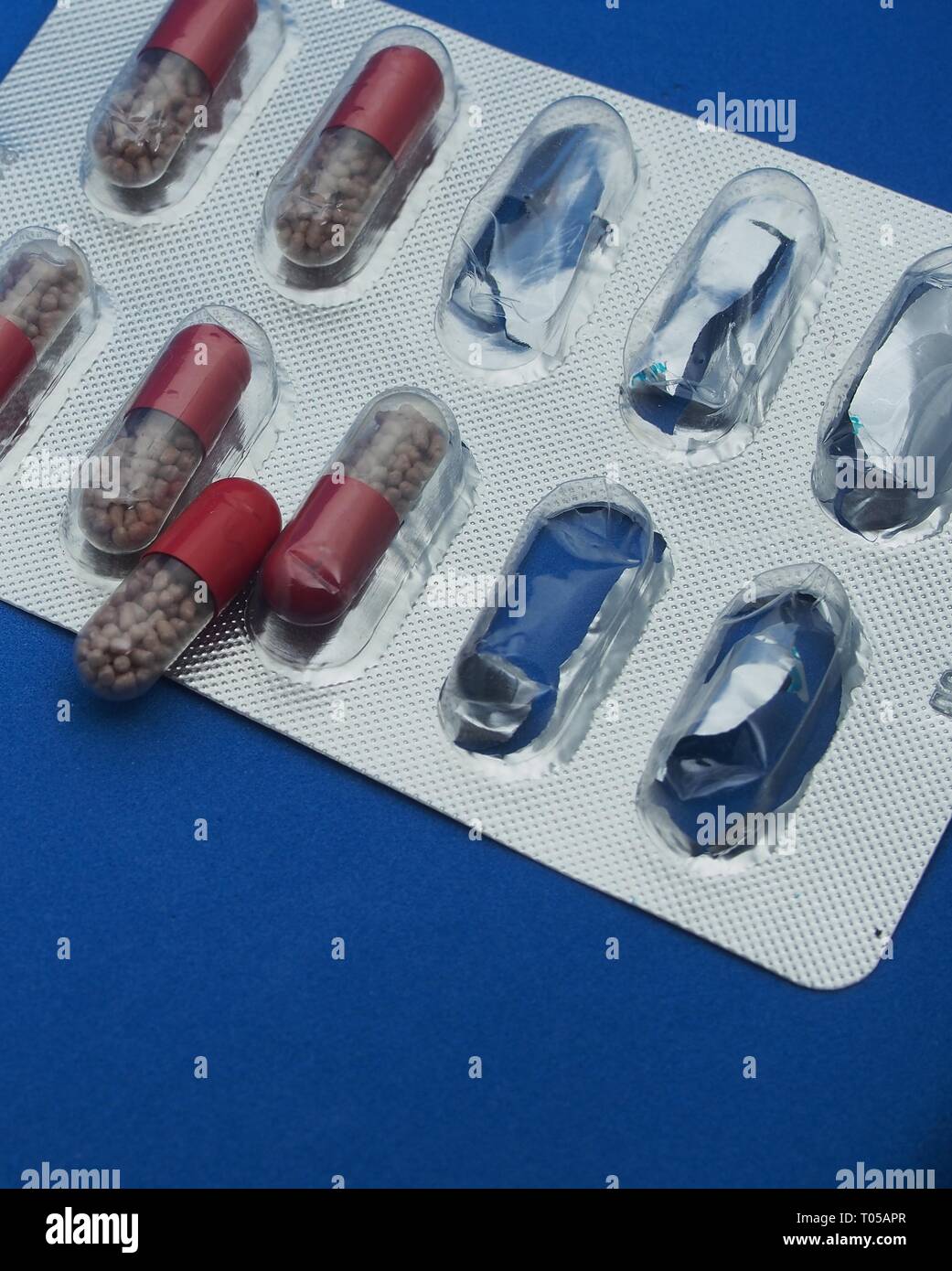 The drug in capsules. Capsules lie in plastic transparent packaging ...