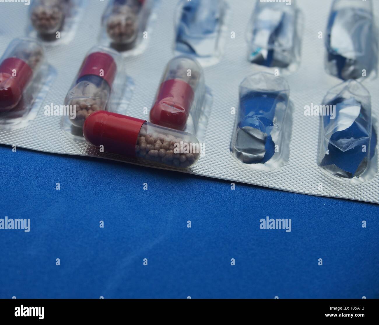 The drug in capsules. Capsules lie in plastic transparent packaging ...