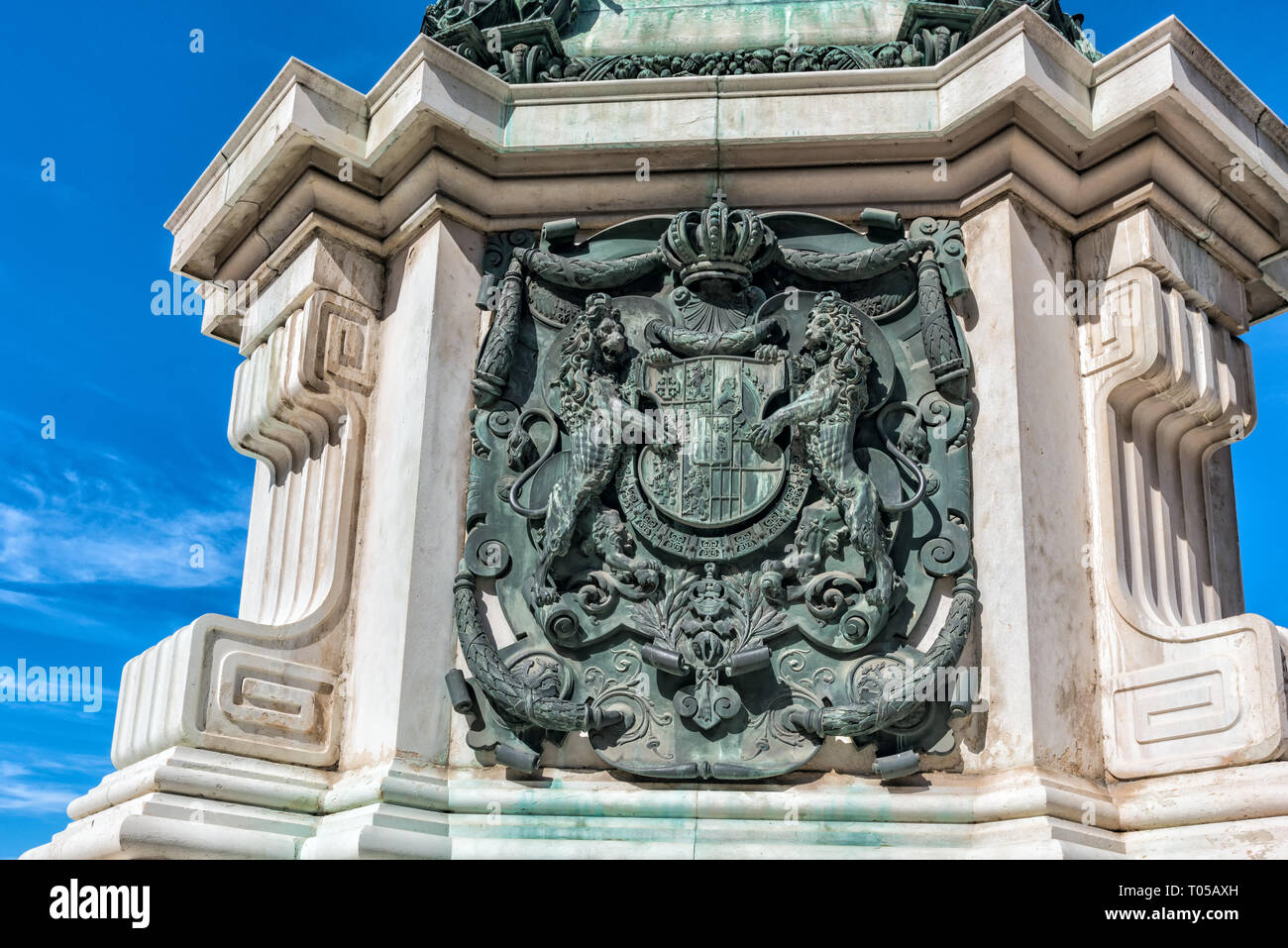 Coat of arms on the statue of Emperor Joseph II and Hofburg Palace ...