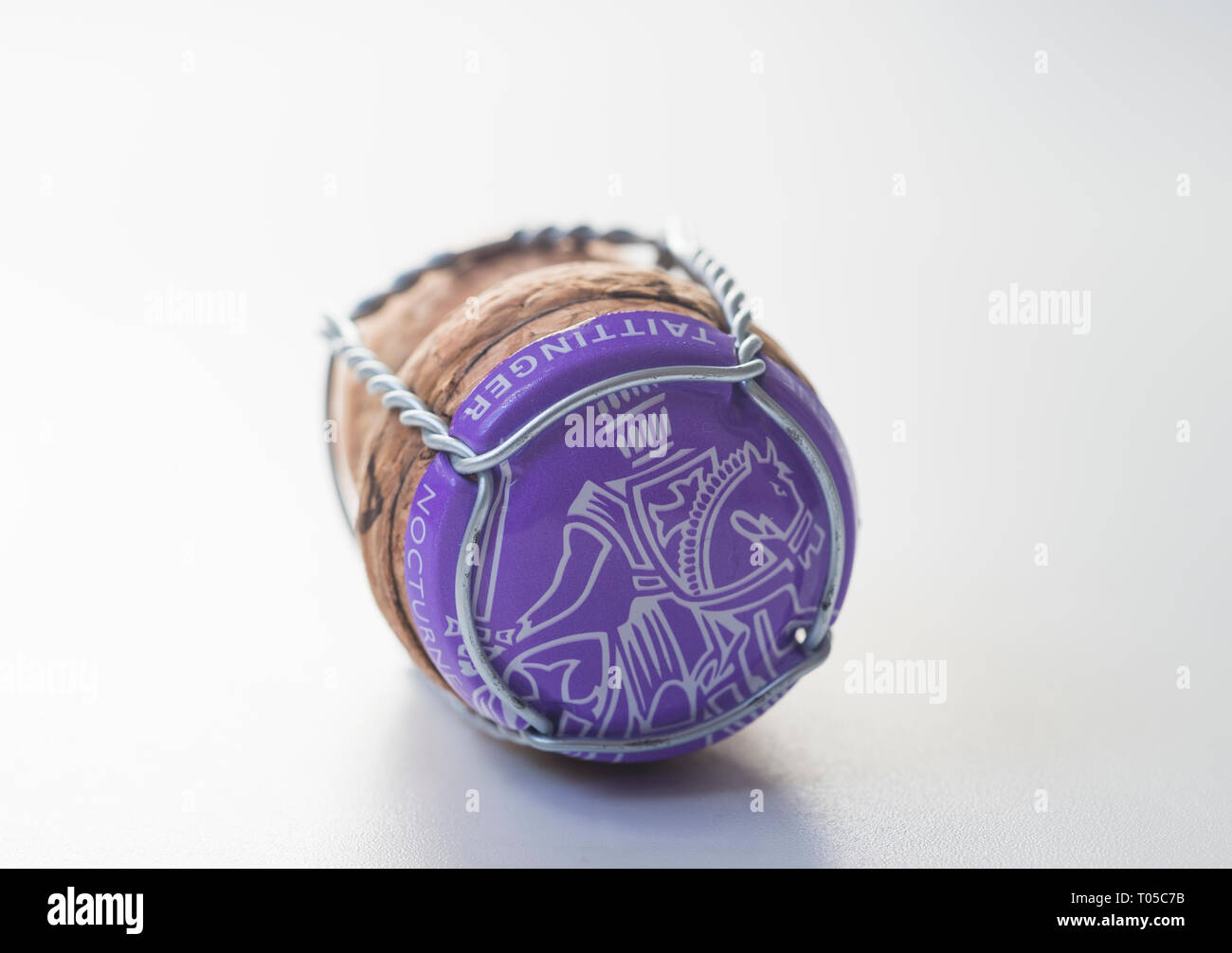 Taittinger Champagne cork, wire and foil on a white background Stock ...