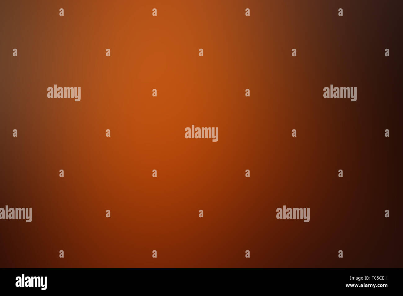 brown blurred background. dark orange background gradient Stock Photo ...