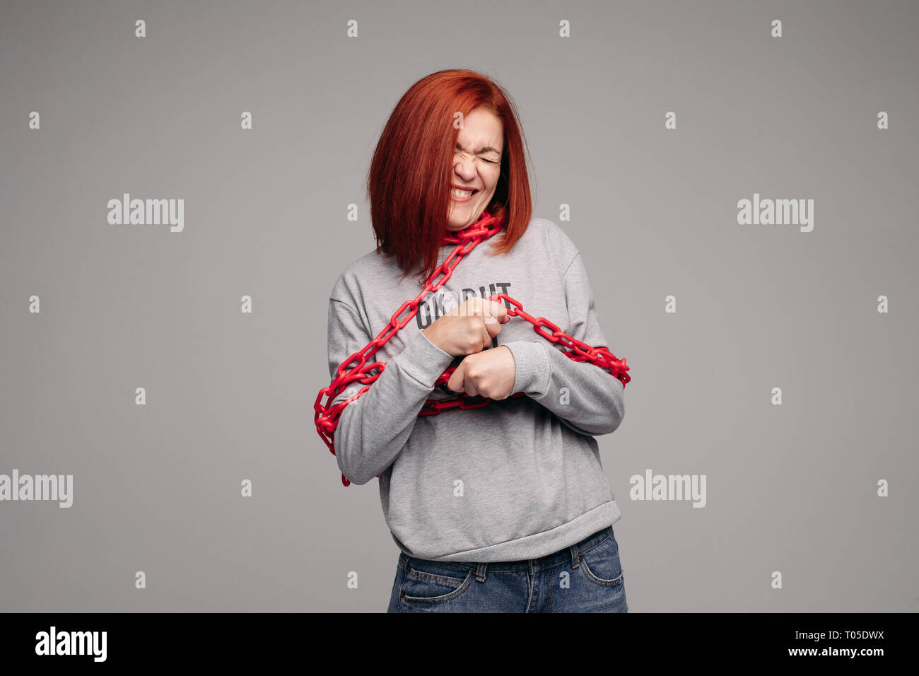 Girl in chains hi-res stock photography and images - Alamy