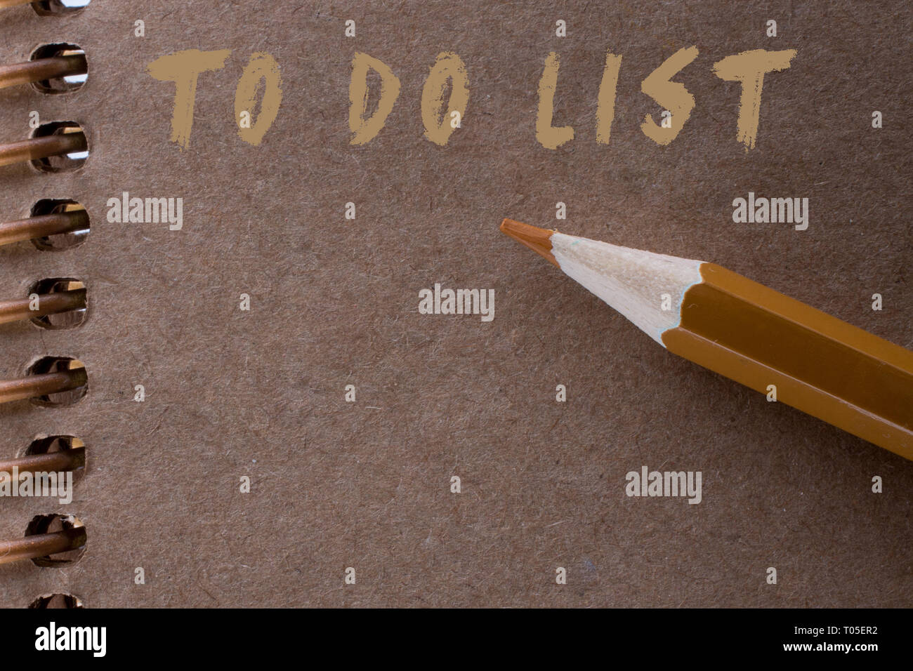 Pencil and To do list label on a note paper Stock Photo - Alamy