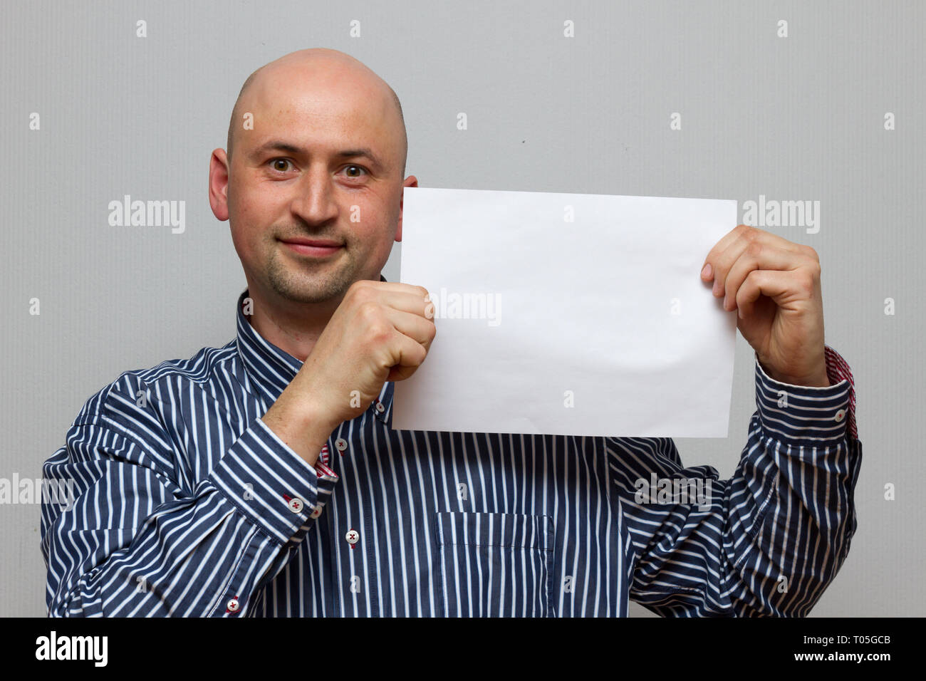 Bald head advertisement hi-res stock photography and images - Alamy
