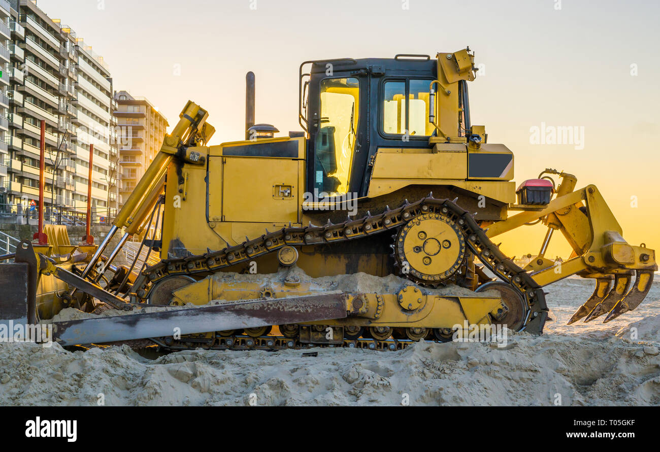 bulldozer at the beach, ground moving equipment, heavy machinery ...