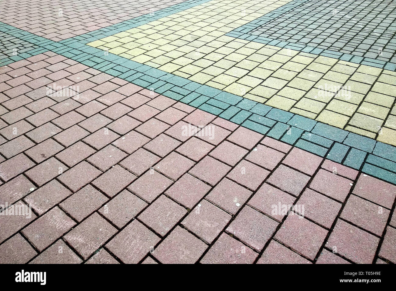 Stone pavement in perspective. Granite cobblestone pavement tiles Stock ...