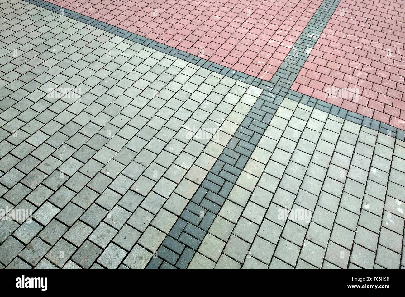 Stone pavement in perspective. Granite cobblestone pavement tiles Stock ...