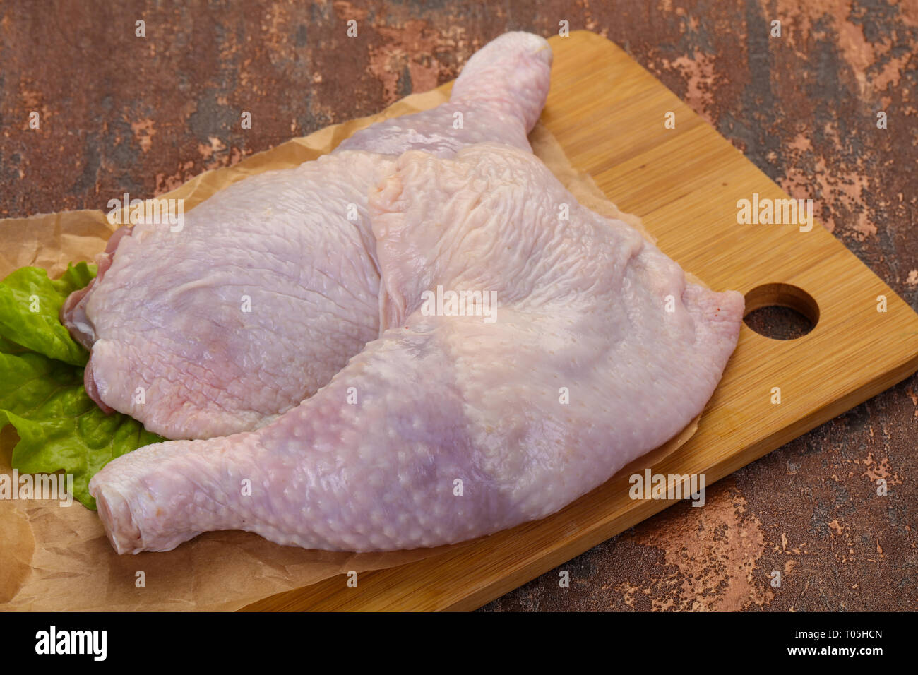 Raw chicken leg ready for cooking Stock Photo - Alamy