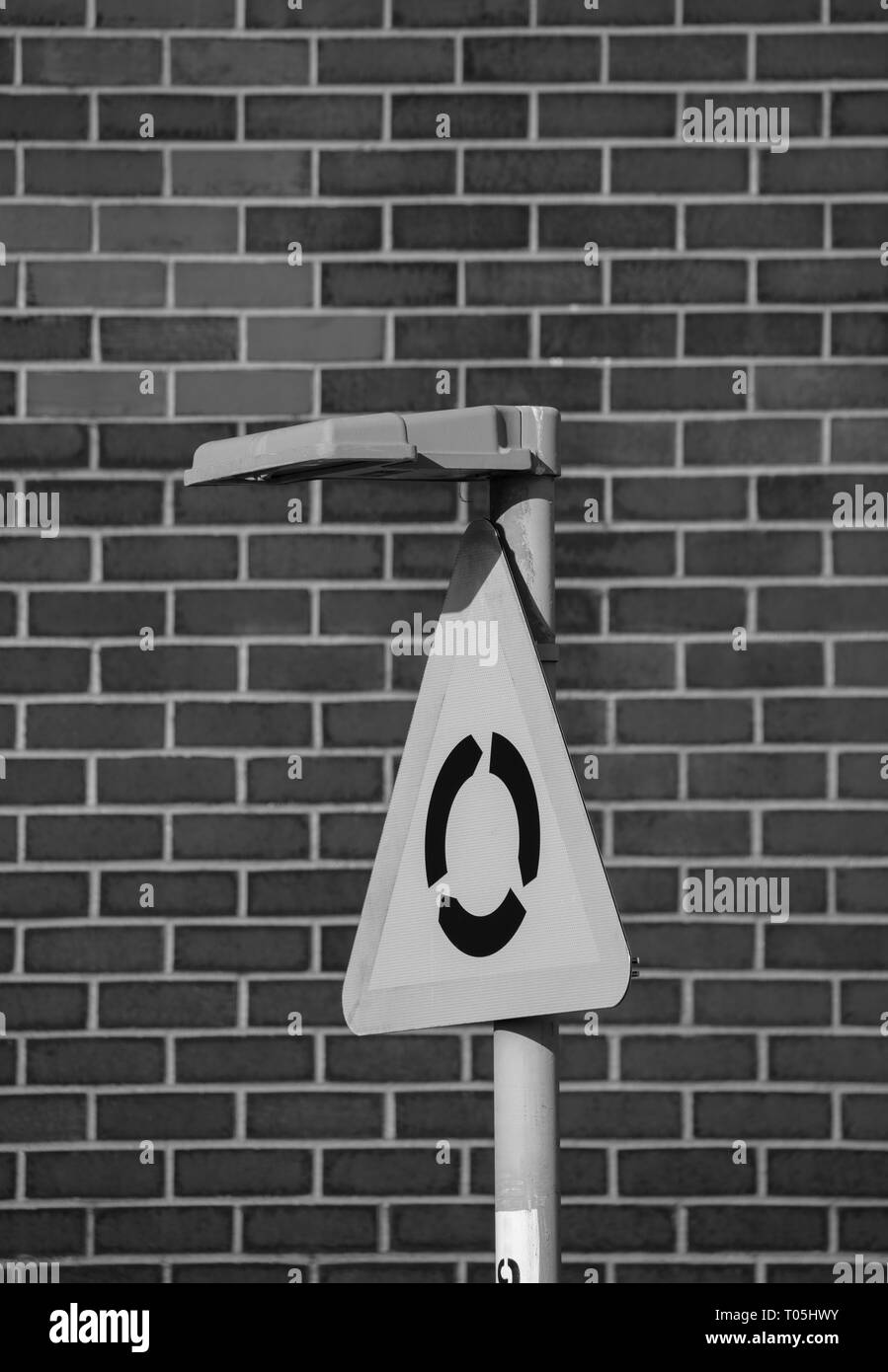 Give way and roundabout sign Black and White Stock Photos & Images - Alamy