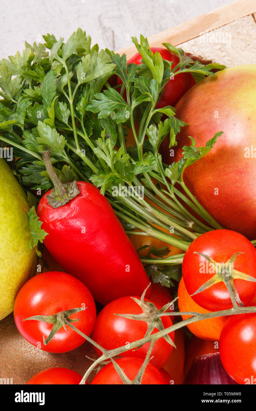 Fresh natural fruits and vegetables in wooden box. Nutritious food ...