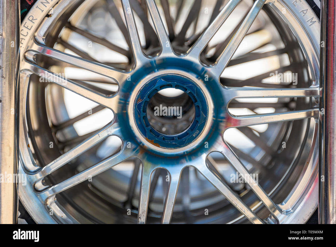 Chrome spokes or a motor sport racing wheel rim Stock Photo - Alamy