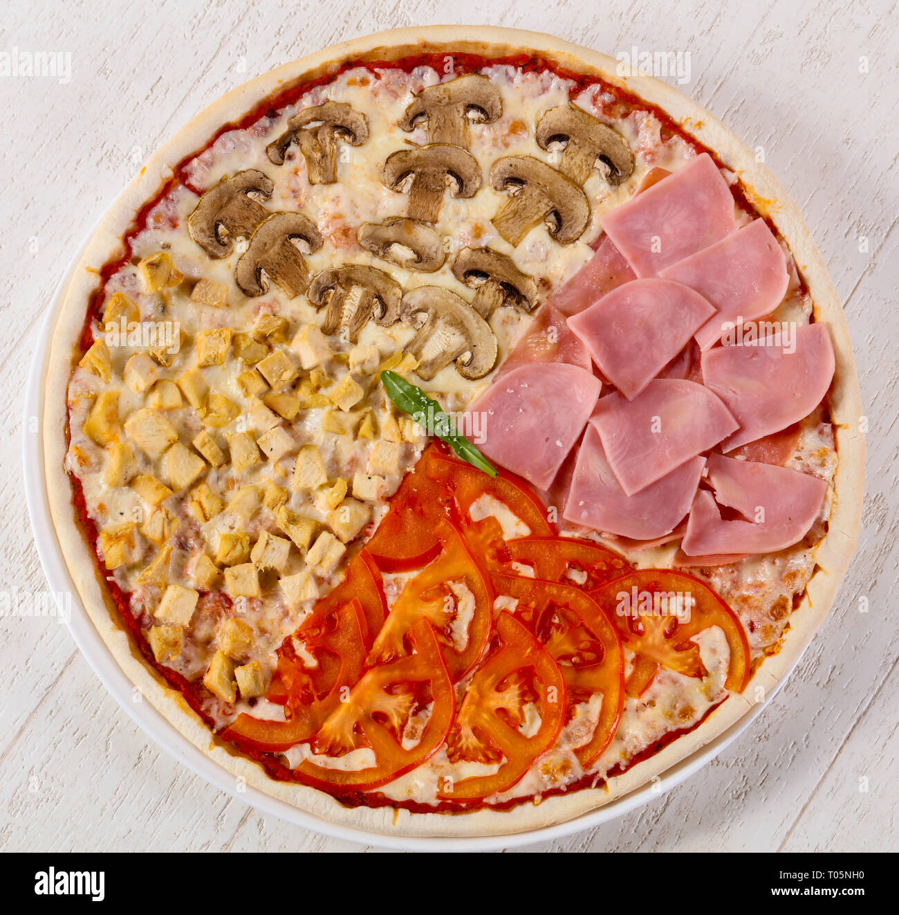 Pizza assortment mix with ham and mushrooms Stock Photo - Alamy