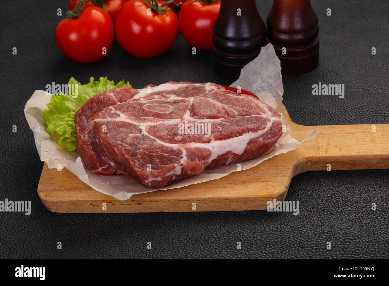 Raw pork neck steak ready for cooking Stock Photo - Alamy