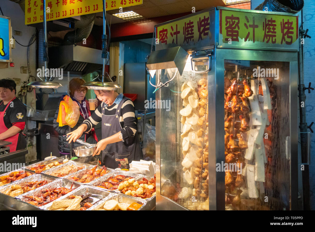 Taipei, Taiwan - March 2019: Street food vendor at Shilin night market ...