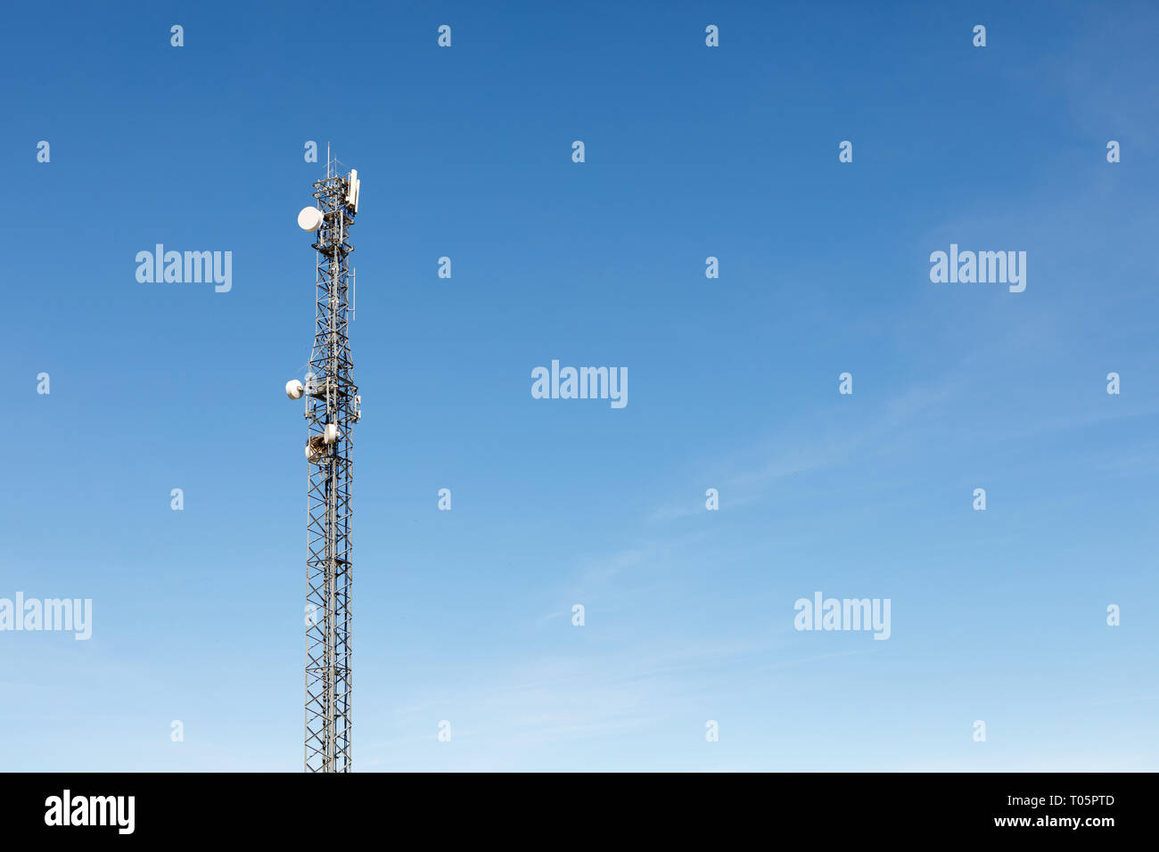 Very tall antenna tower for communication Stock Photo - Alamy