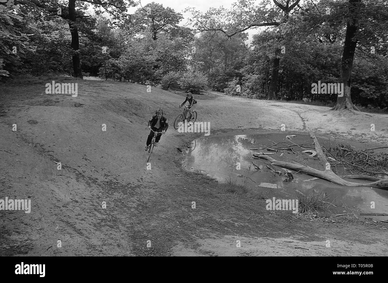Cyclists go around the 'bomb/bell pits' in Middleton Woods in the 1970s ...
