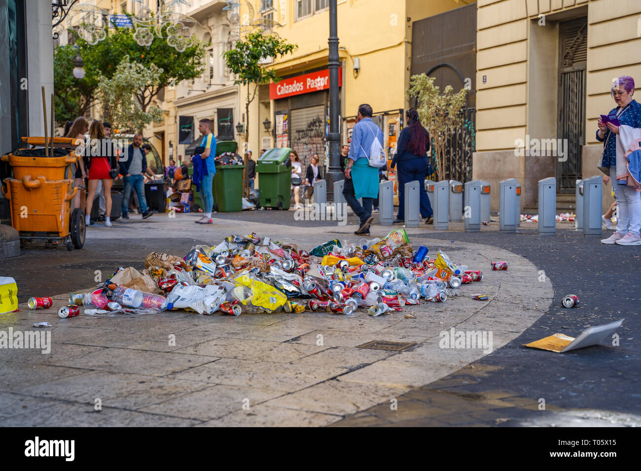 Valencia, Spain. 16th March 2019. Garbage at the street and empty bib ...