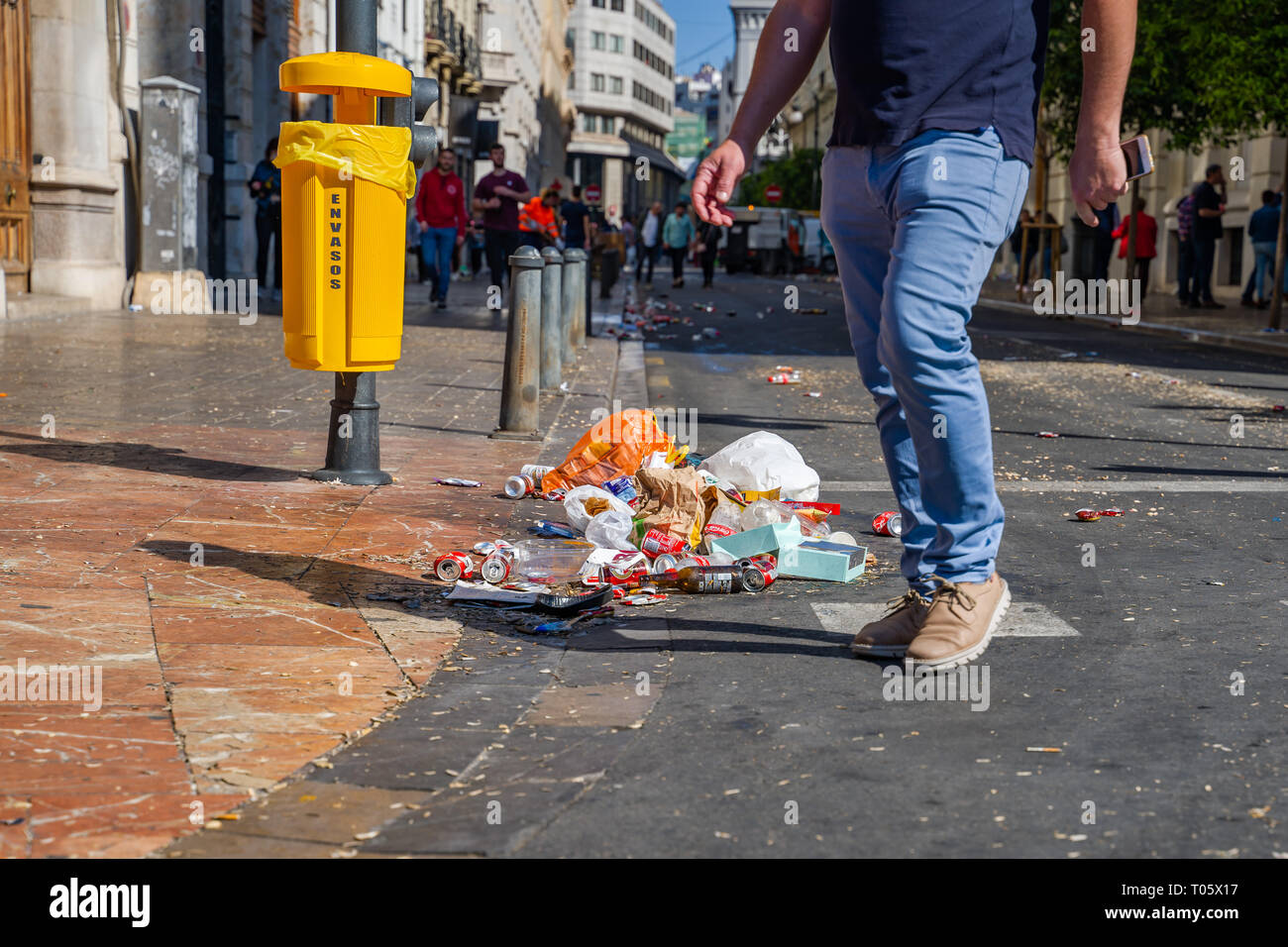 Valencia, Spain. 16th March 2019. Garbage at the street and empty bib ...