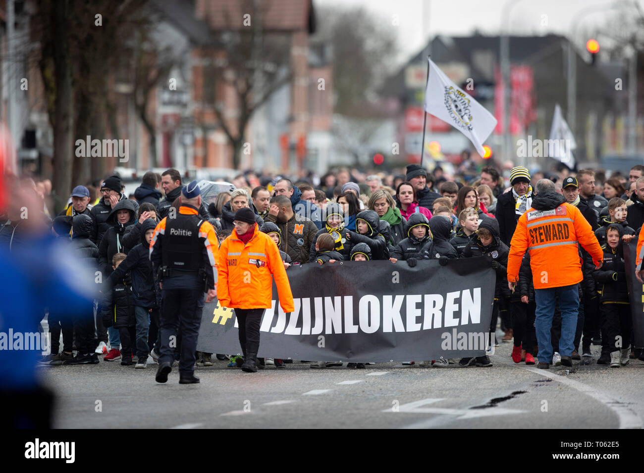 Lokeren, Belgium. 17th Mar, 2019. Under police escort supporters of ...
