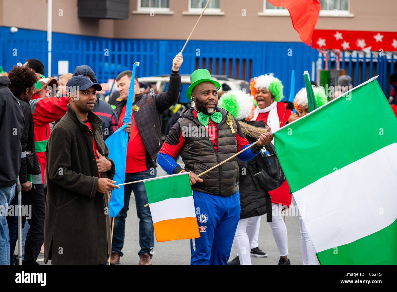 St. Patrick's Day and Africans emigrants refugees take part in the ...