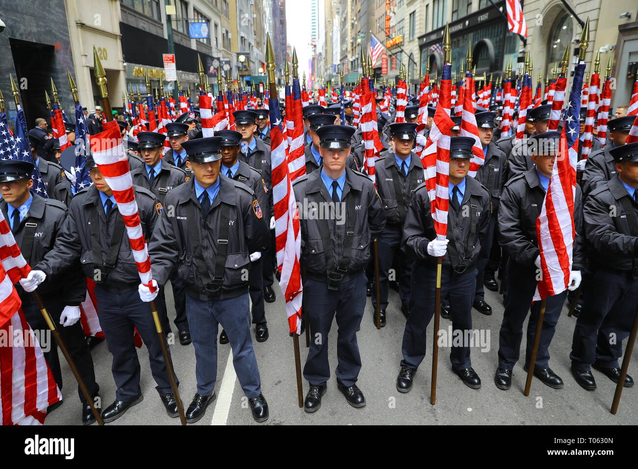 New York, USA . 16th Mar, 2019. Members of the FDNY Color Guard are ...