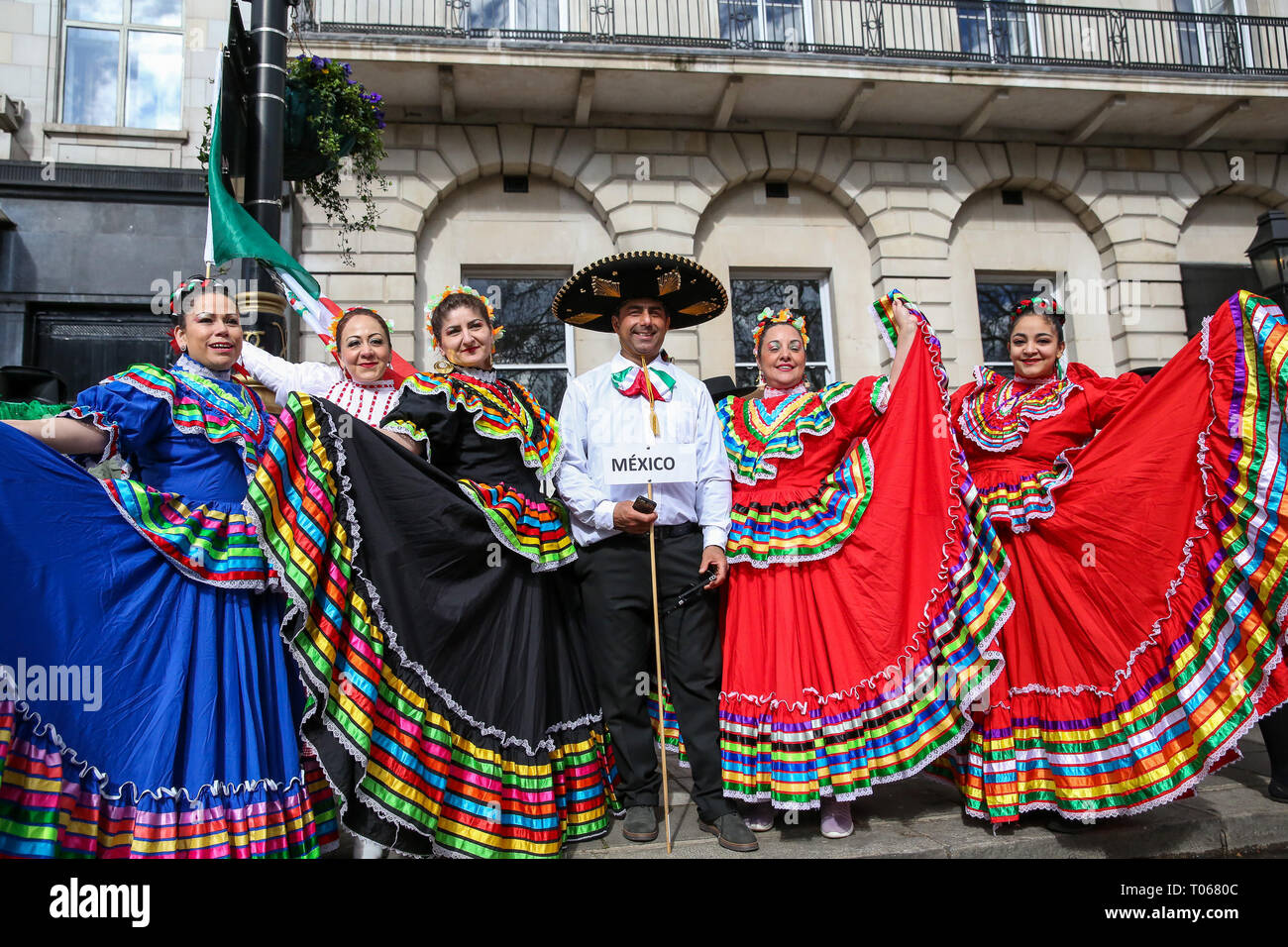 London, UK, UK. 17th Mar, 2019. Mexicans in colourful costume are seen ...