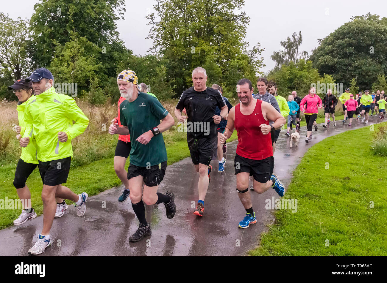 Rainy day runners hi-res stock photography and images - Alamy