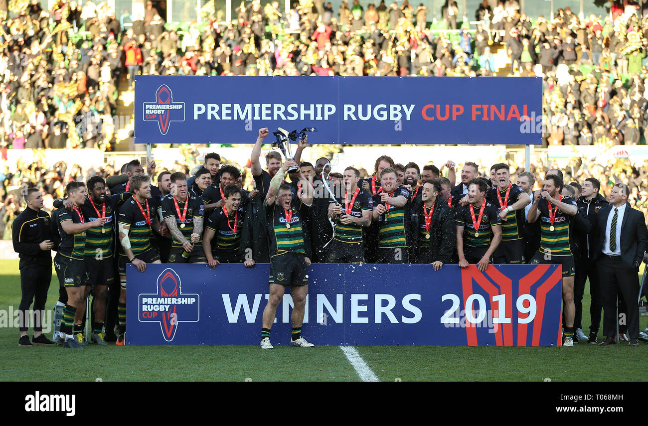 Northampton Saints players celebrate with the trophy after winning the ...