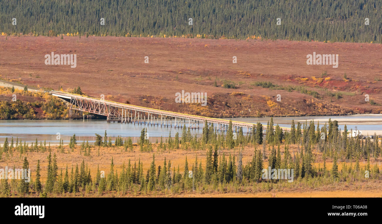 Flat bridge across the Susitna river provides passage for the Denali ...