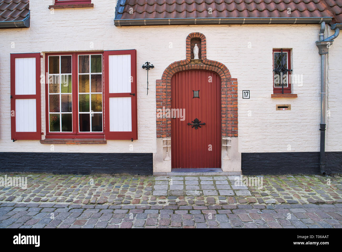 BRUGES, BELGIUM - FEBRUARY 17, 2019: historic house with shutters on ...