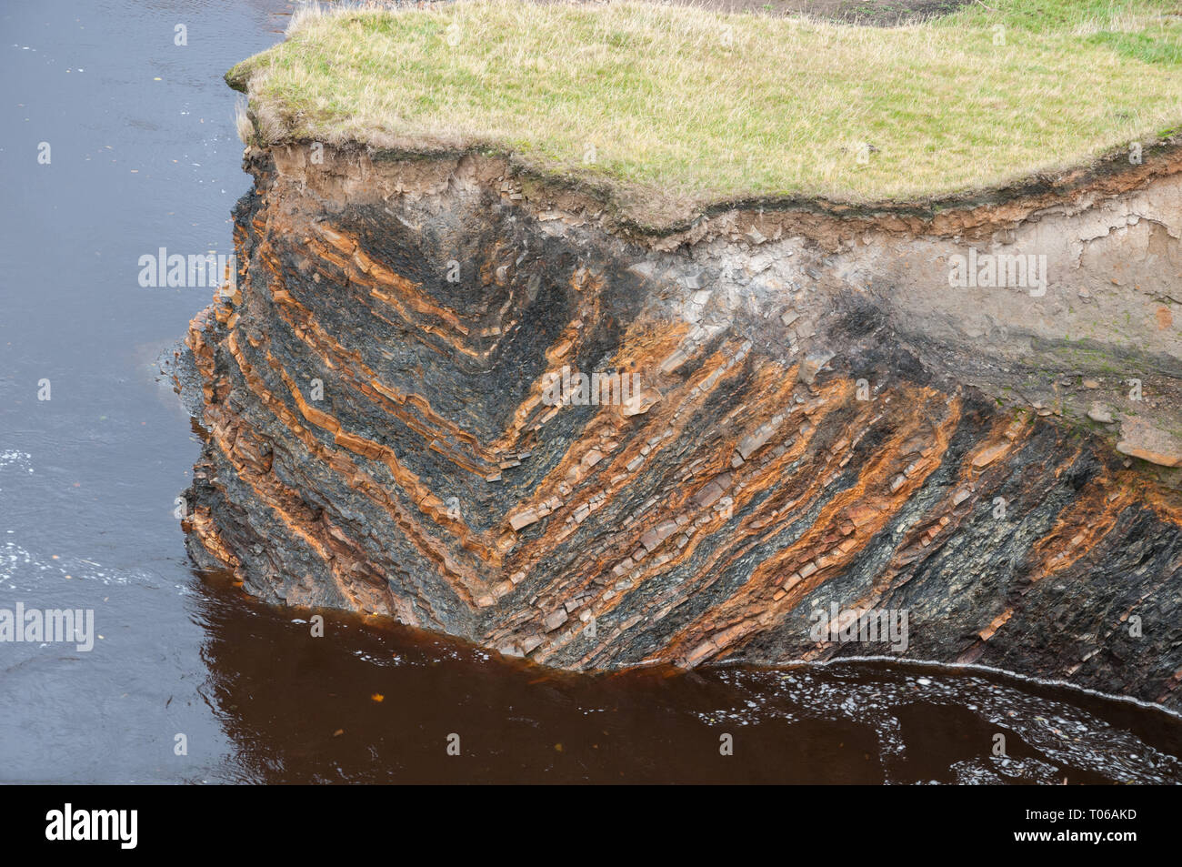 Folded rock strata due to valley bulging, Peak District National Park ...