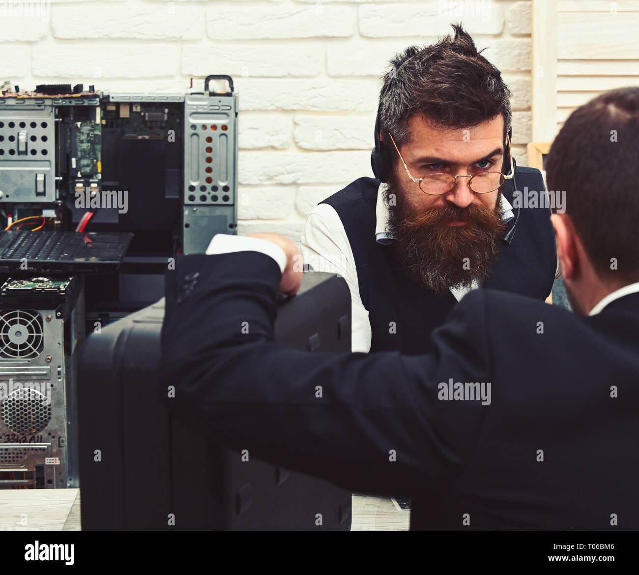 Making a deal. Company manager and man have business meeting. Customer ...